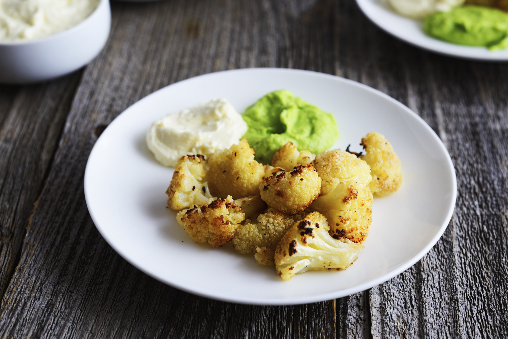 Etch's Roasted Cauliflower with Pea Pesto and Feta Crema - Edible Nashville
