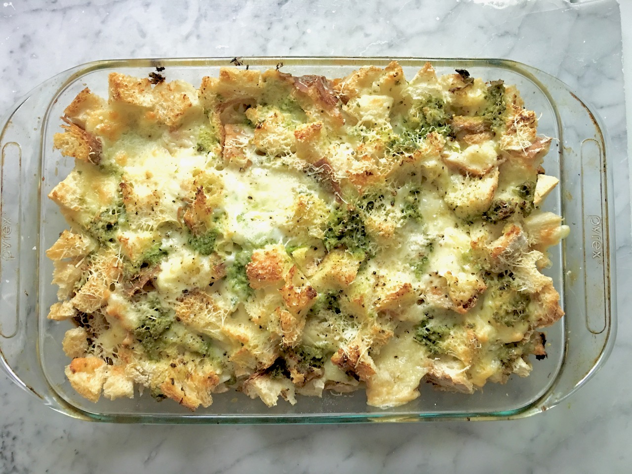Bread Pudding with Feta and Garlic Scape Pesto - Edible Nashville